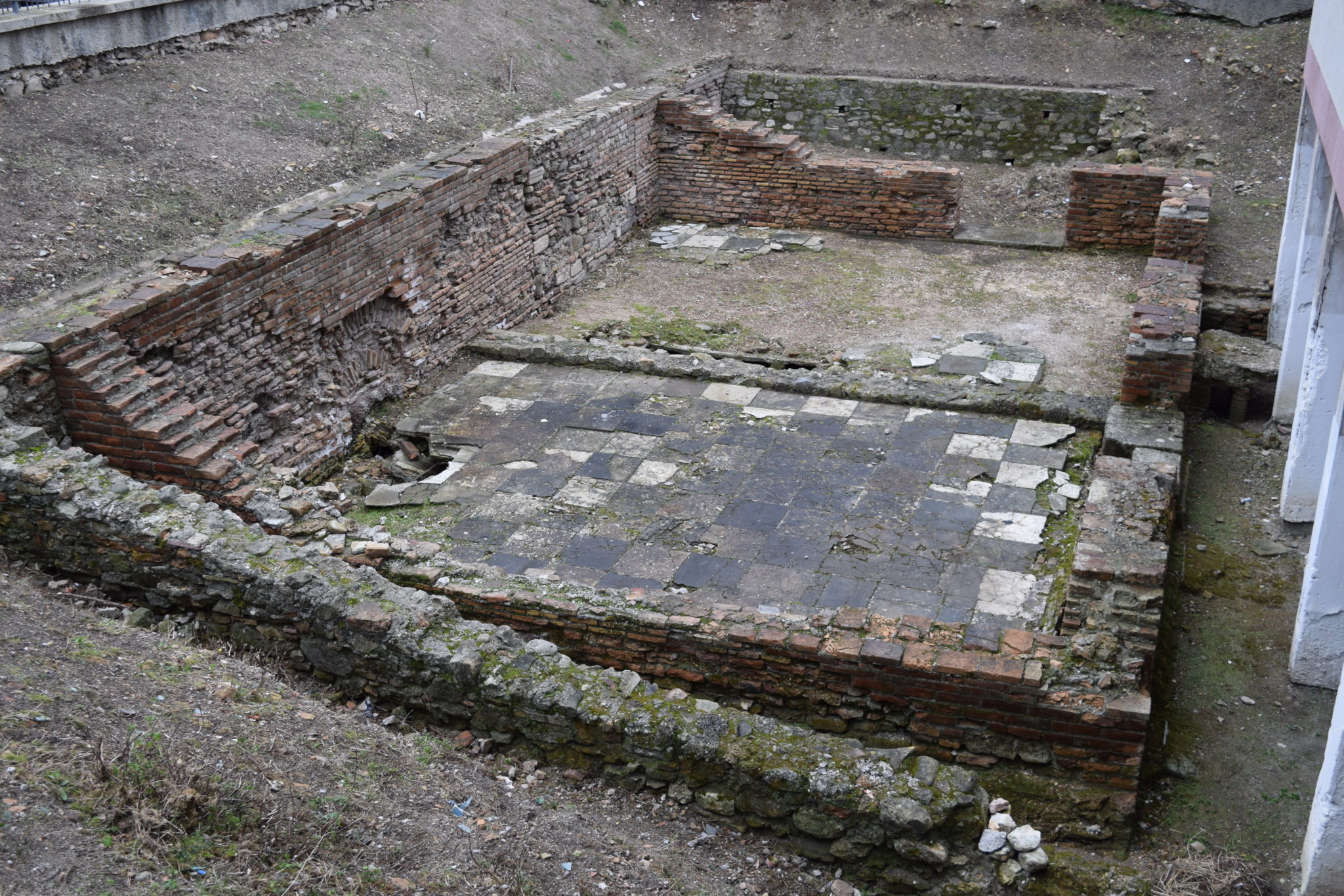 Roman public bath complex in Durres, hidden behind railings - Amfora